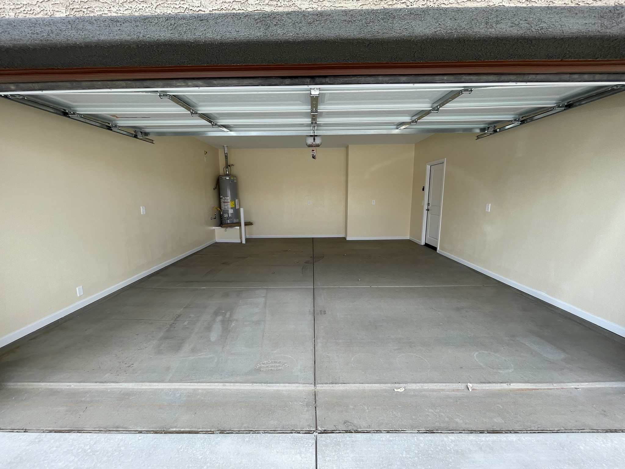 Garage, walkway, and backyard concrete coating patio project completed ...